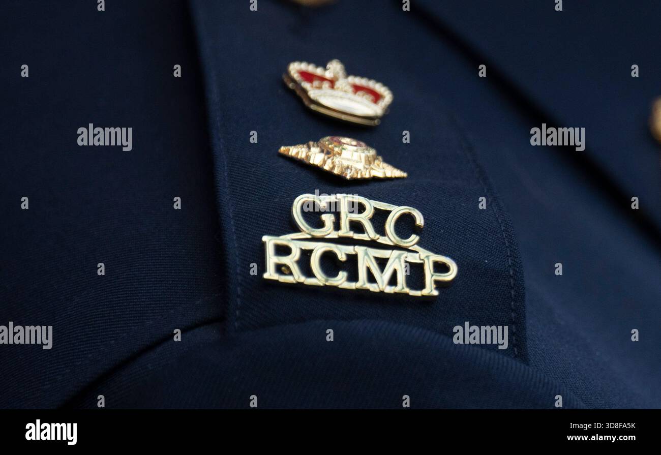 The RCMP logo is seen on the shoulder of a superintendent during a news ...
