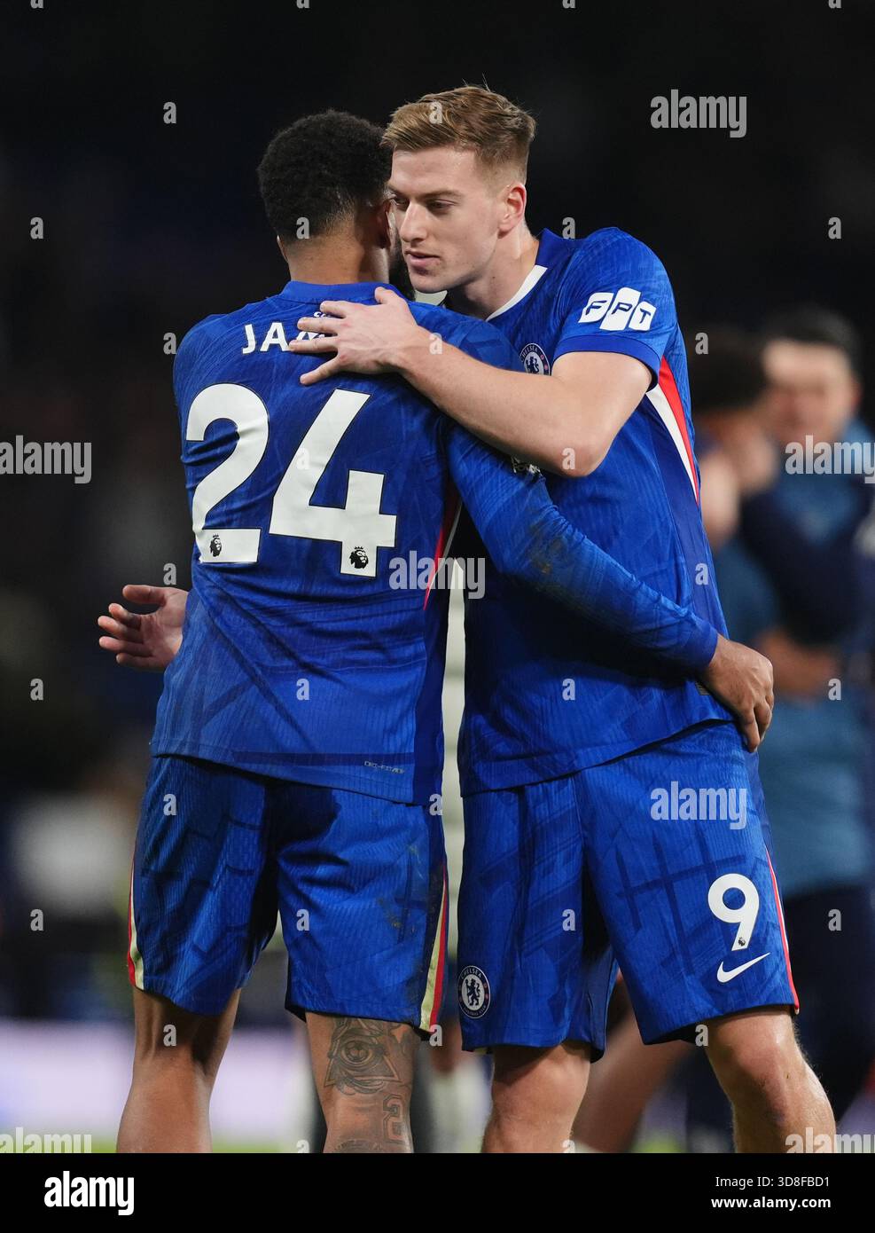 Chelsea's Reece James (left) and Liam Delap embrace after the Premier ...