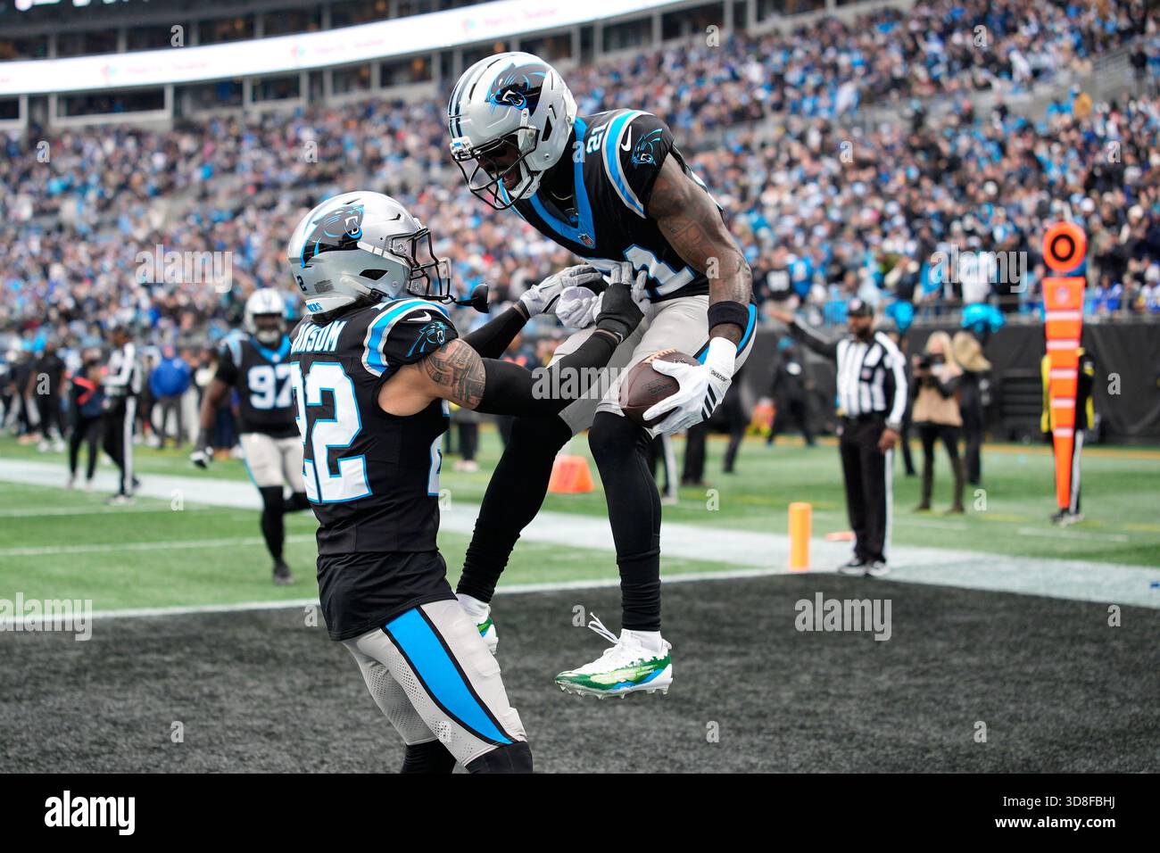 Carolina Panthers safety Nick Scott celebrates with safety Lathan ...