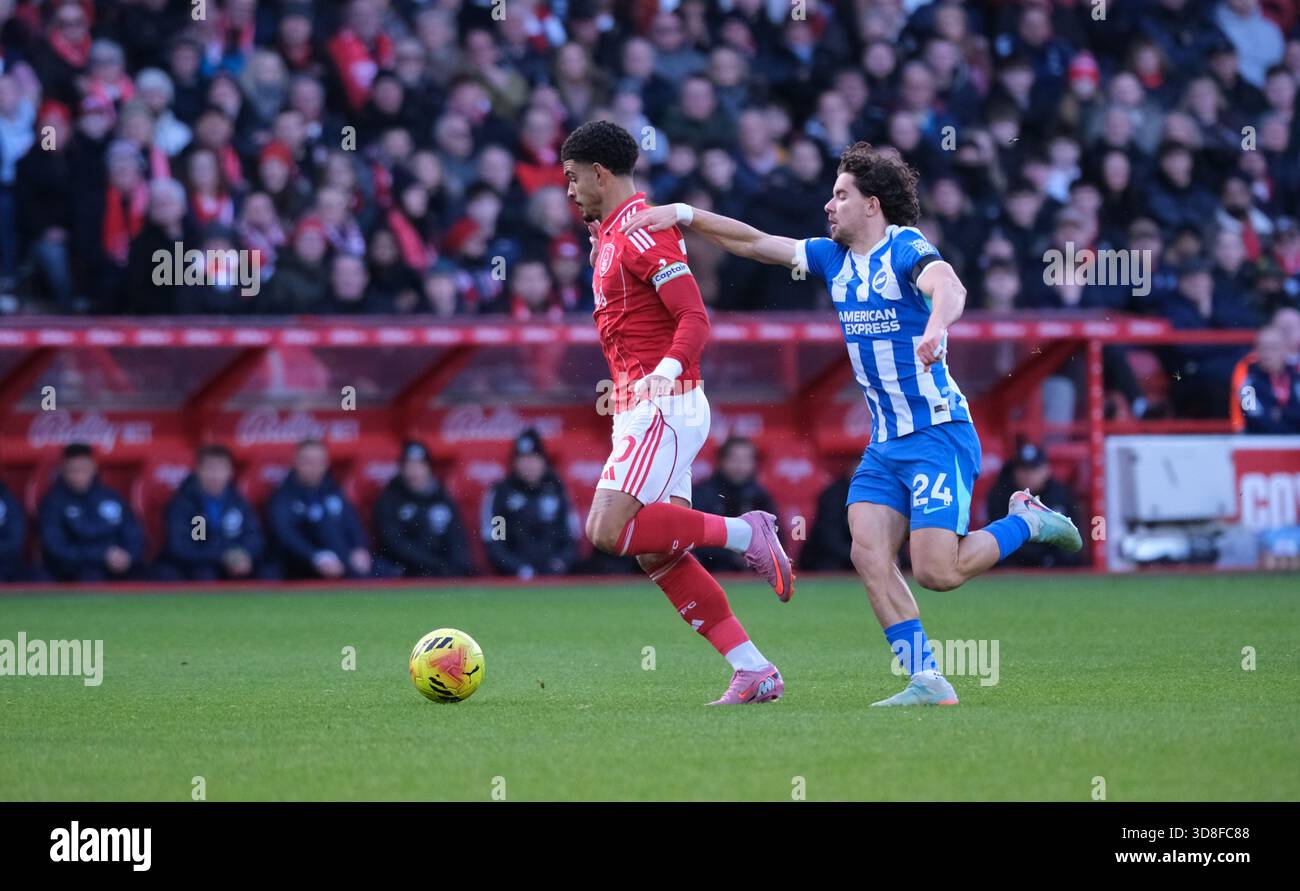 Morgan Gibbs-White of Nottingham Forest competes for the ball with ...