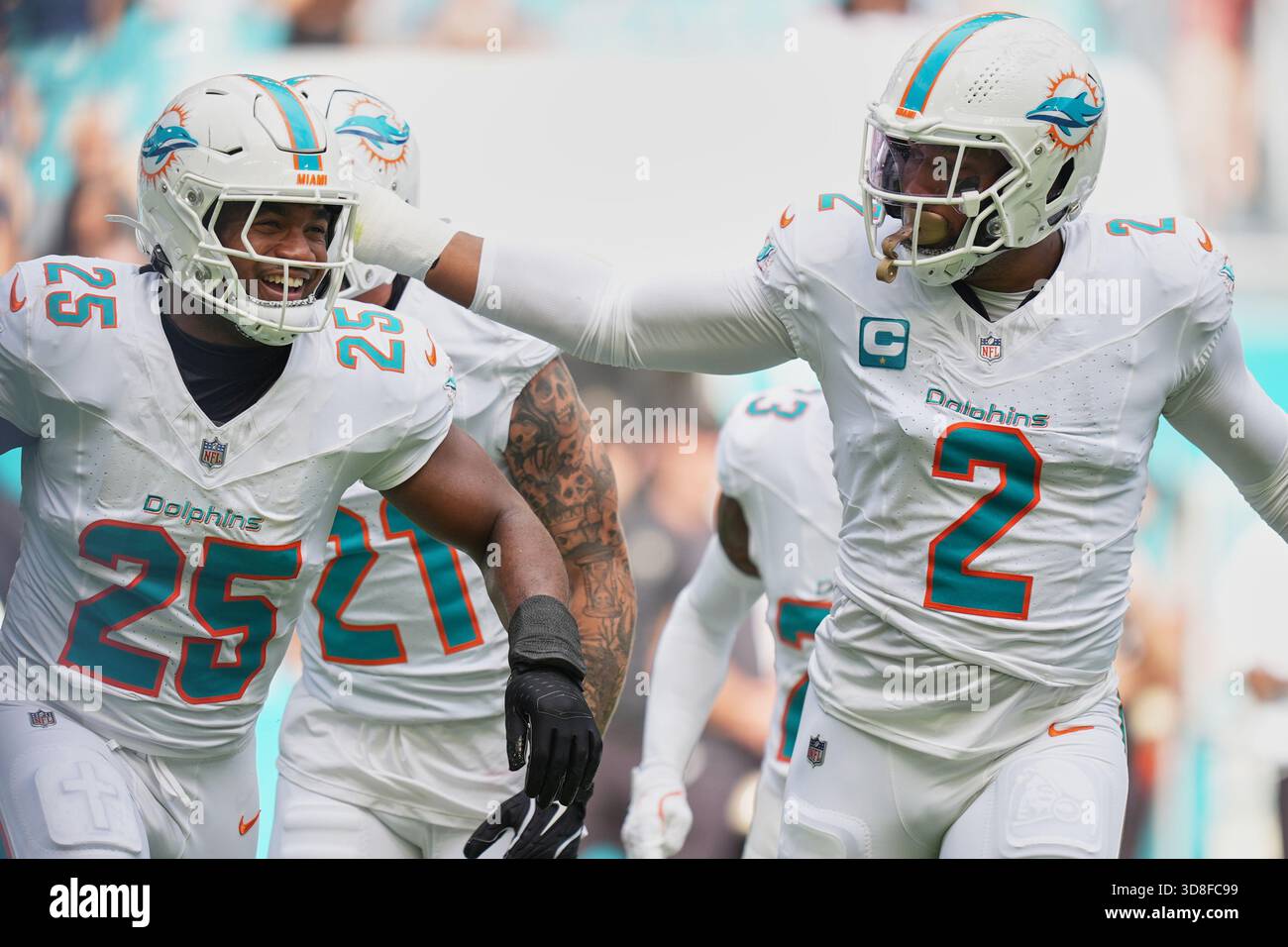 Miami Dolphins linebackers Tyrel Dodson (25) and Bradley Chubb (2 ...