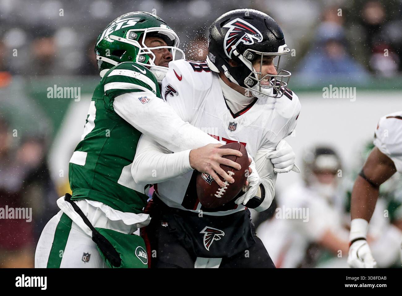 New York Jets safety Tony Adams (22) sacks Atlanta Falcons quarterback ...