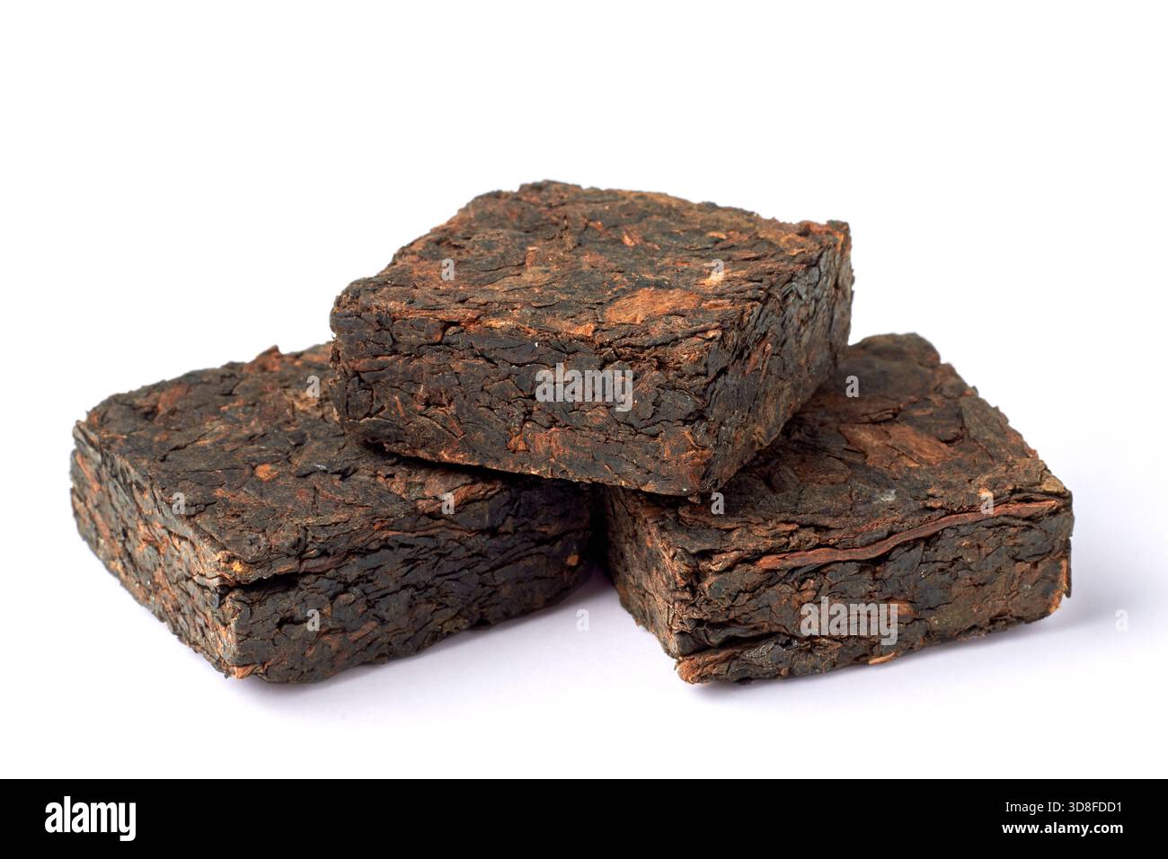 Black pu-erh Chinese tea. Pressed tiles of fermented black tea isolated ...