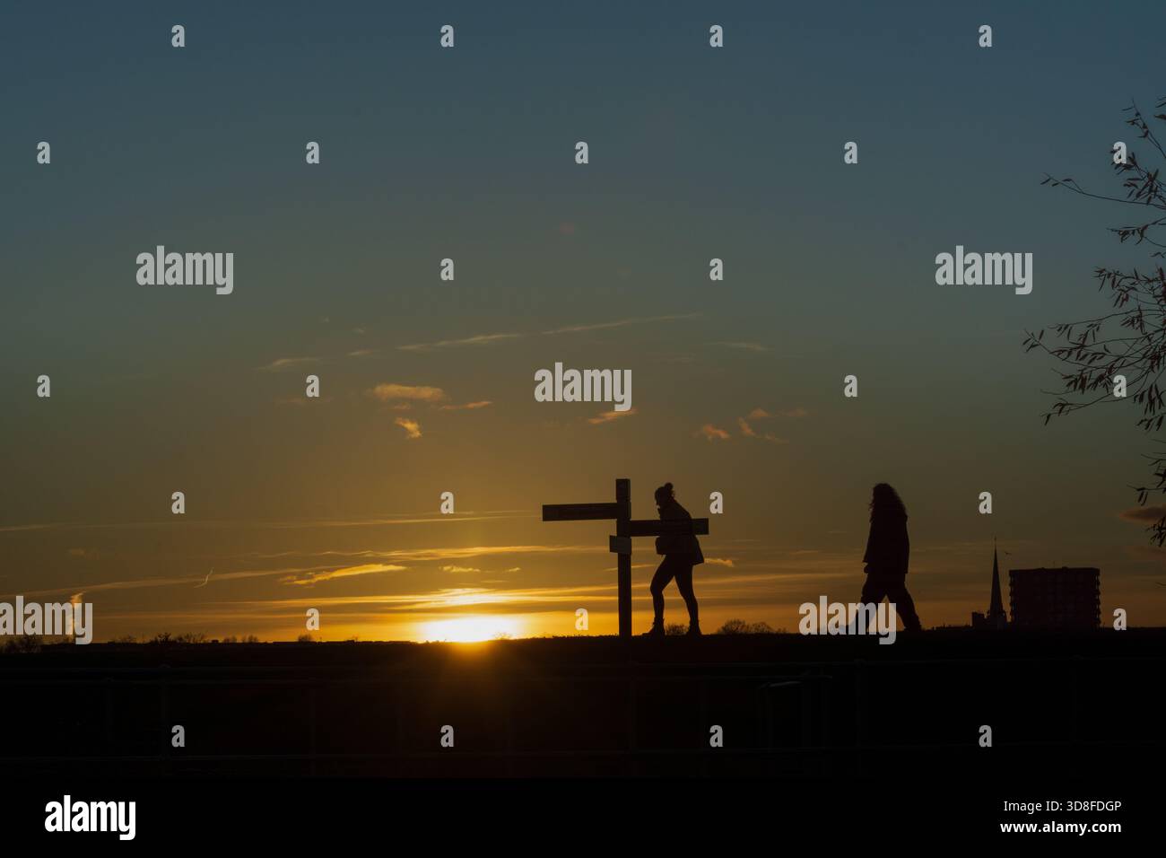 London, England. 30th, November, 2025. London walkers enjoy the winter sunset after a full day ...