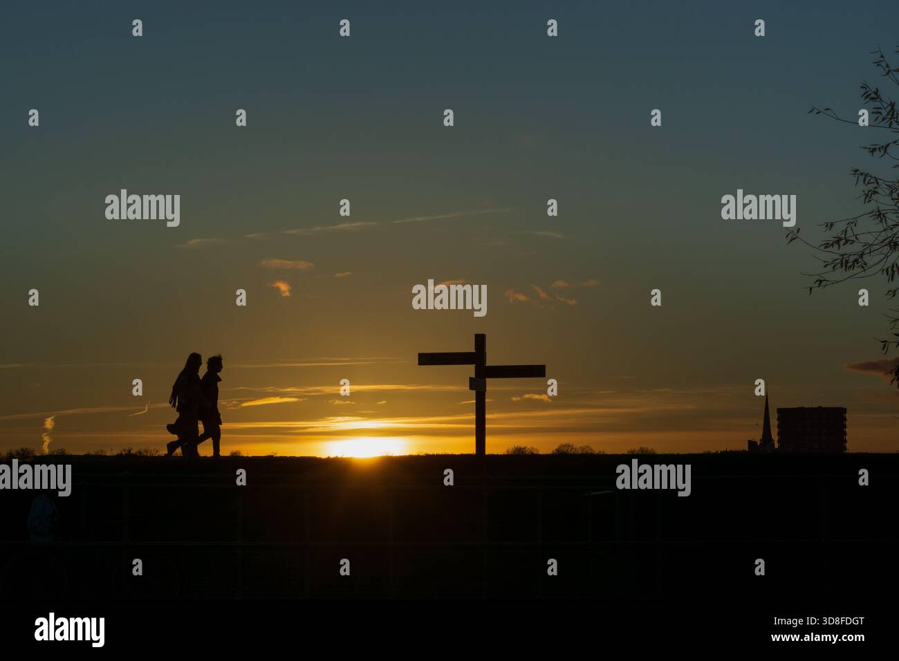 London, England. 30th, November, 2025. London walkers enjoy the winter sunset after a full day ...