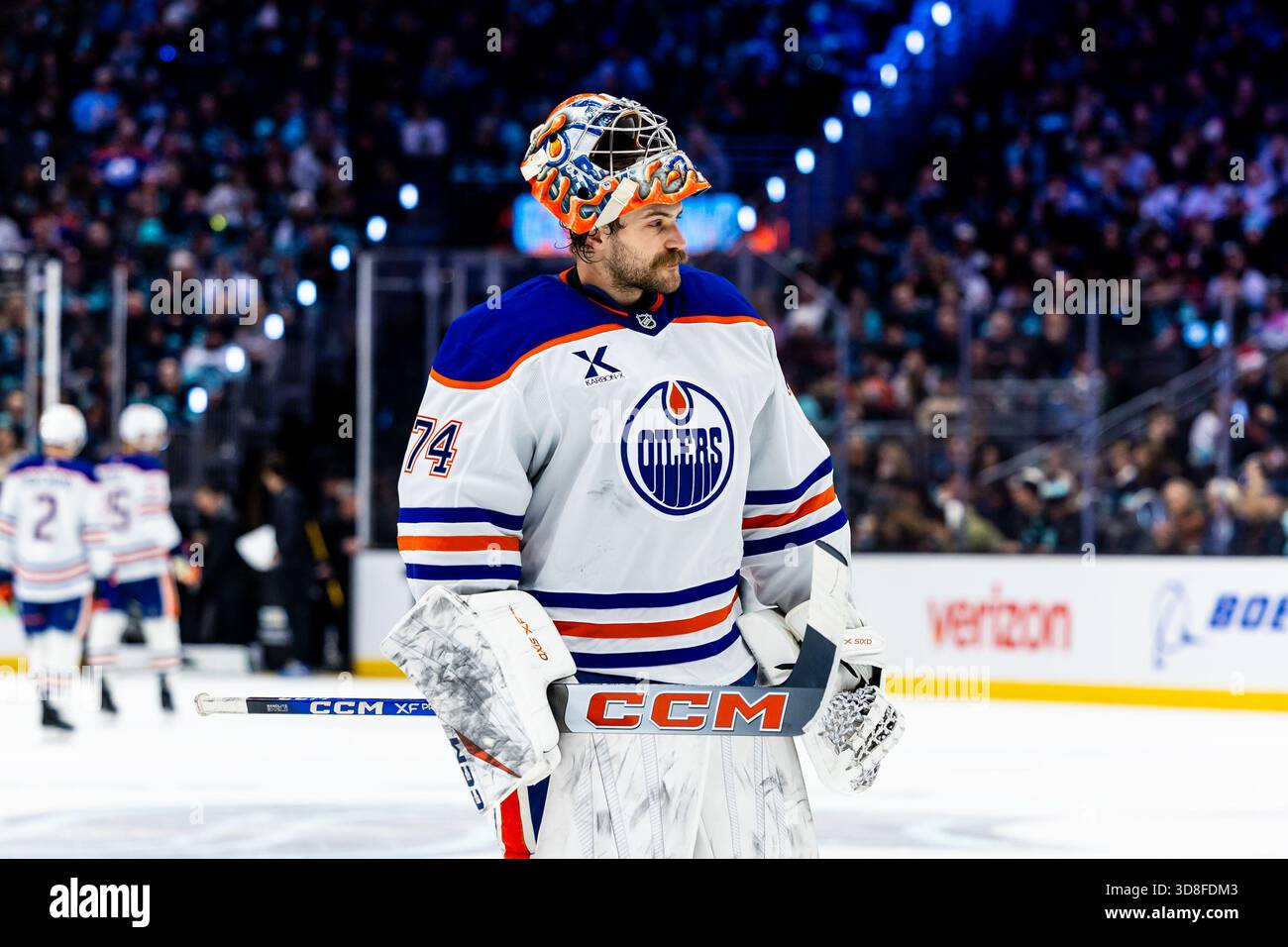 Edmonton Oilers goaltender Stuart Skinner skates back onto the ice ...