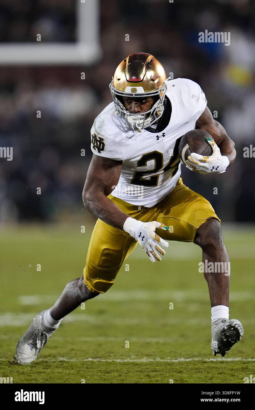 Notre Dame running back Jadarian Price (24) runs with the ball after a ...
