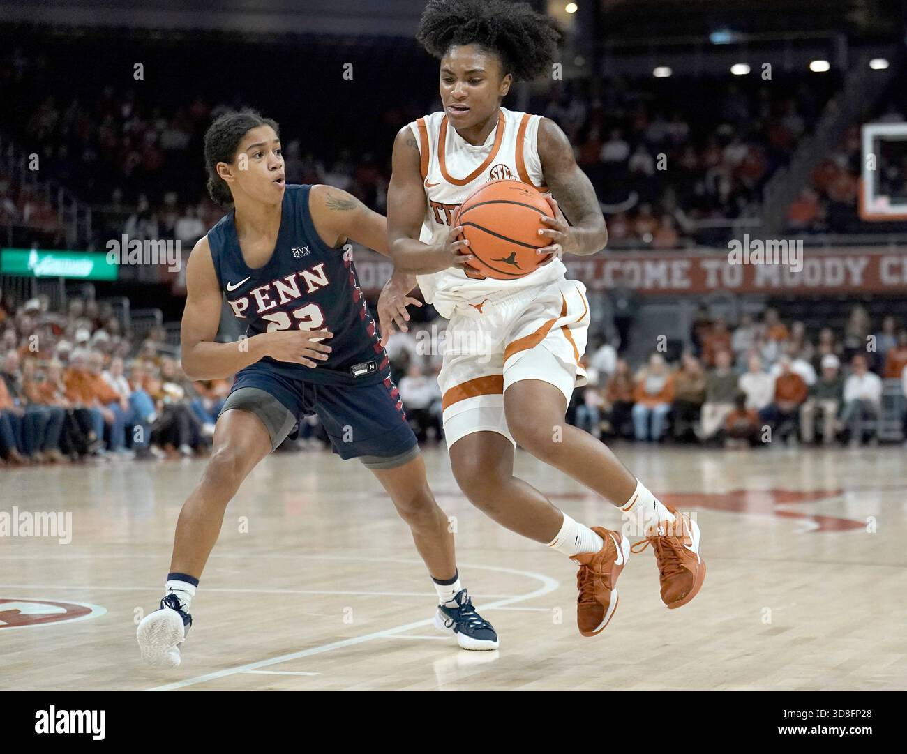 Texas guard Rori Harmon drives against Penn guard Mataya Gayle during ...