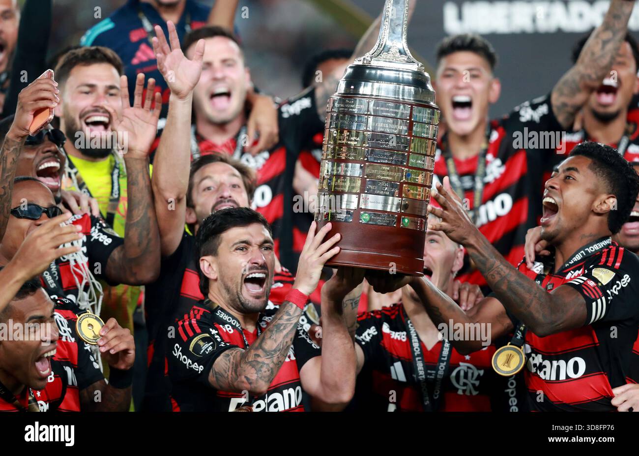 Lima, PERU. 29th Nov, 2025. Flamengo players hold the cup at the end of ...