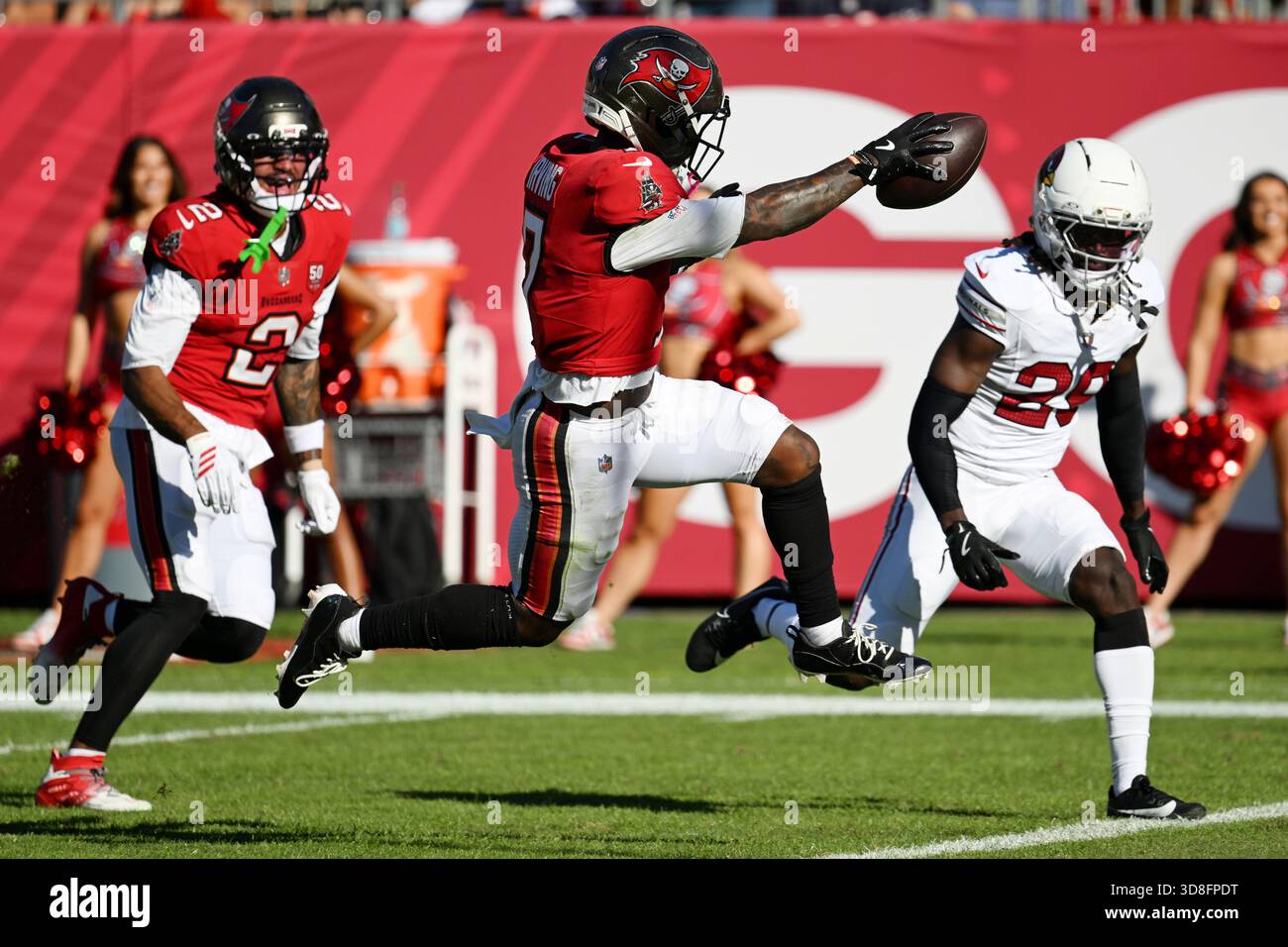 Tampa Bay Buccaneers running back Bucky Irving, center, scores a ...