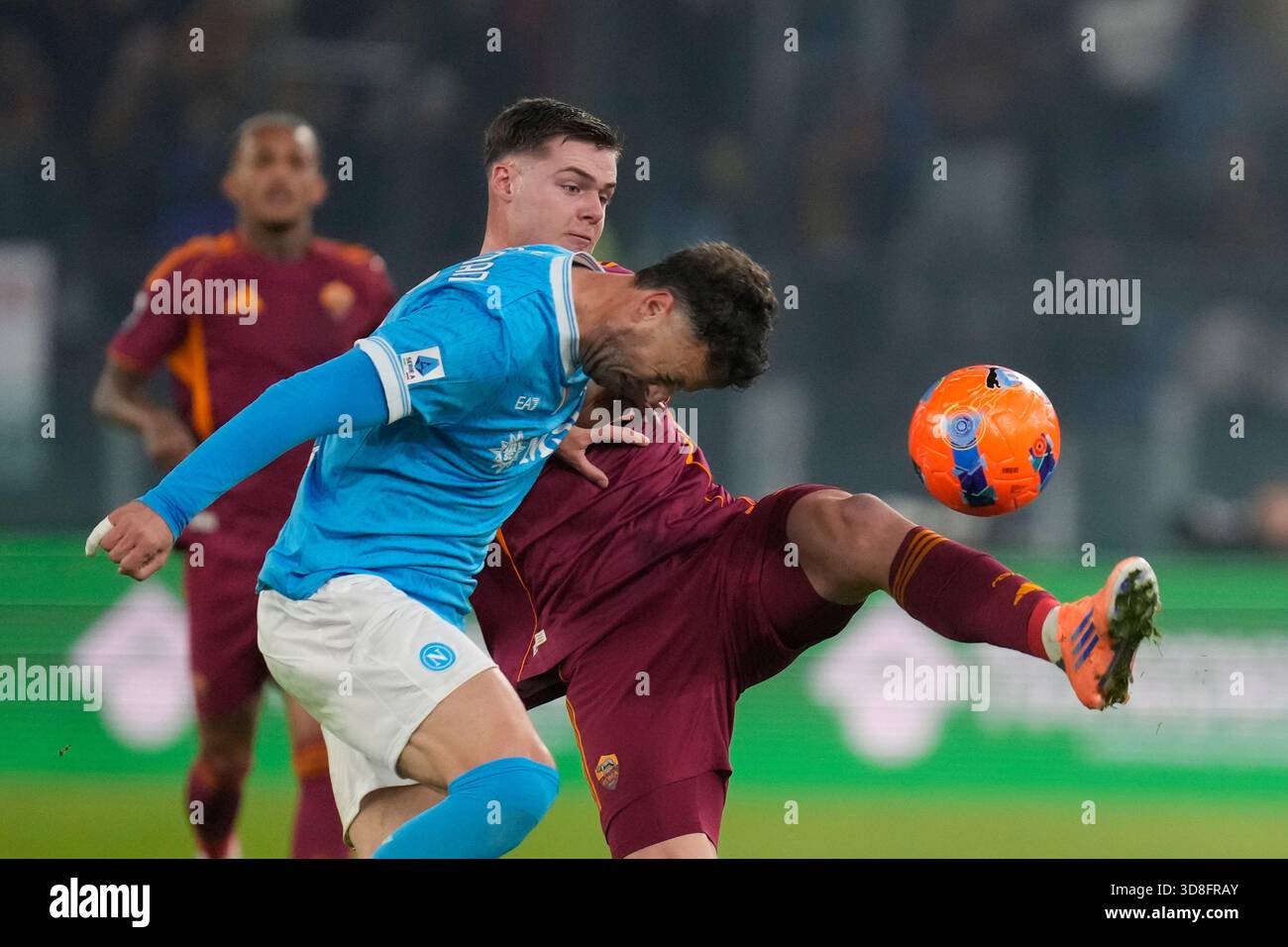 Napoli's Amir Rrahmani challenge for the ball with Roma's Evan Ferguson ...