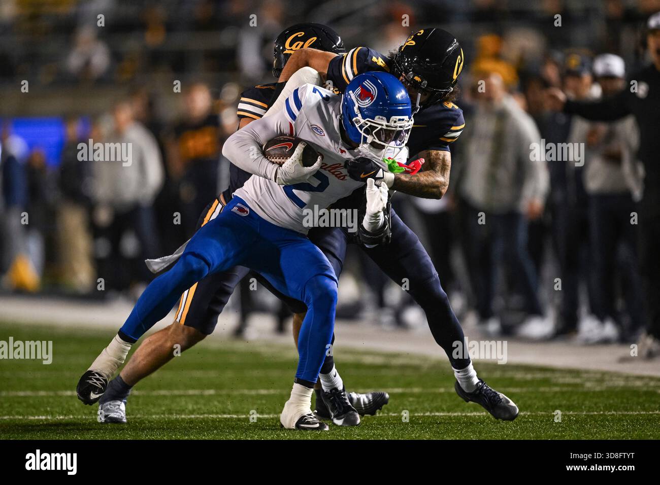 SMU wide receiver Jordan Hudson (2) is tackled by California defensive ...