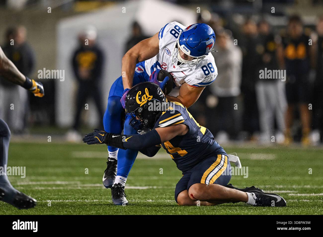 SMU tight end Matthew Hibner (88) is tackled by California defensive ...