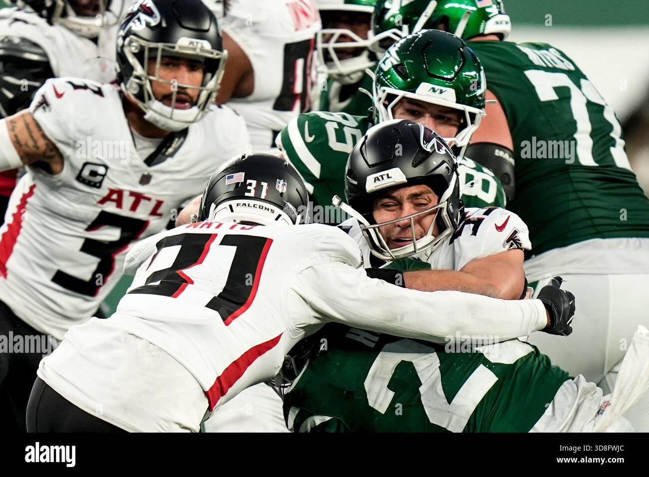 Atlanta Falcons linebacker Kaden Elliss (55) hits New York Jets running ...
