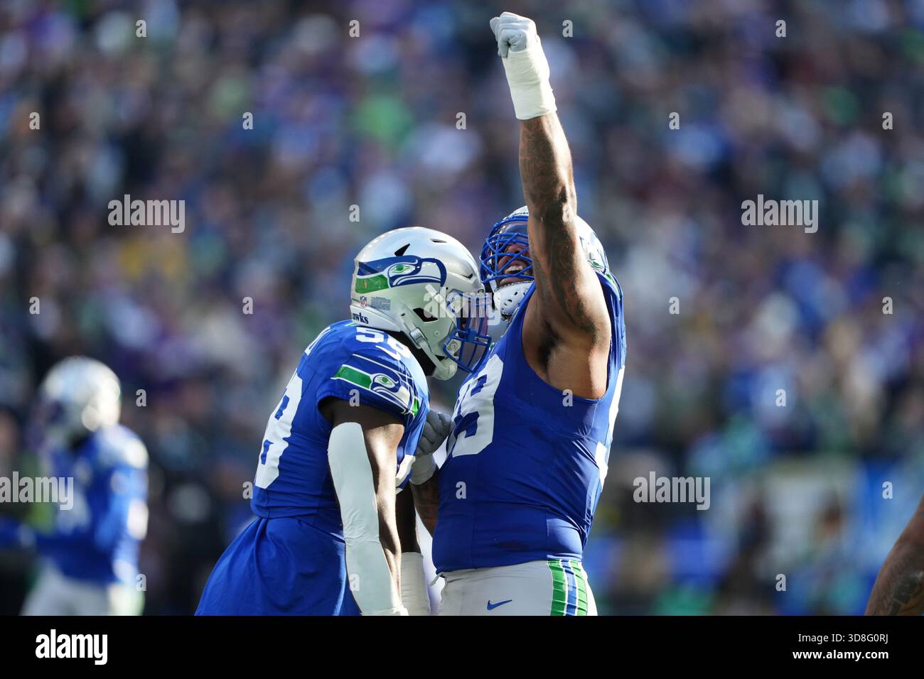 Seattle Seahawks defensive end Leonard Williams celebrates with ...