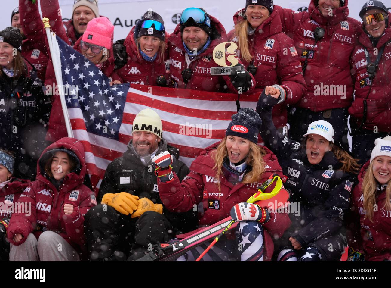 United States' Mikaela Shiffrin poses with her team after a World Cup ...