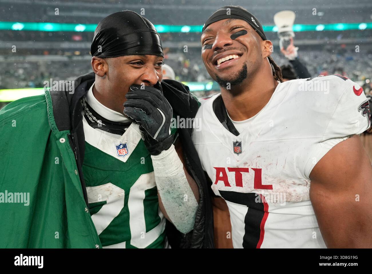 New York Jets running back Breece Hall (20) and Atlanta Falcons running ...
