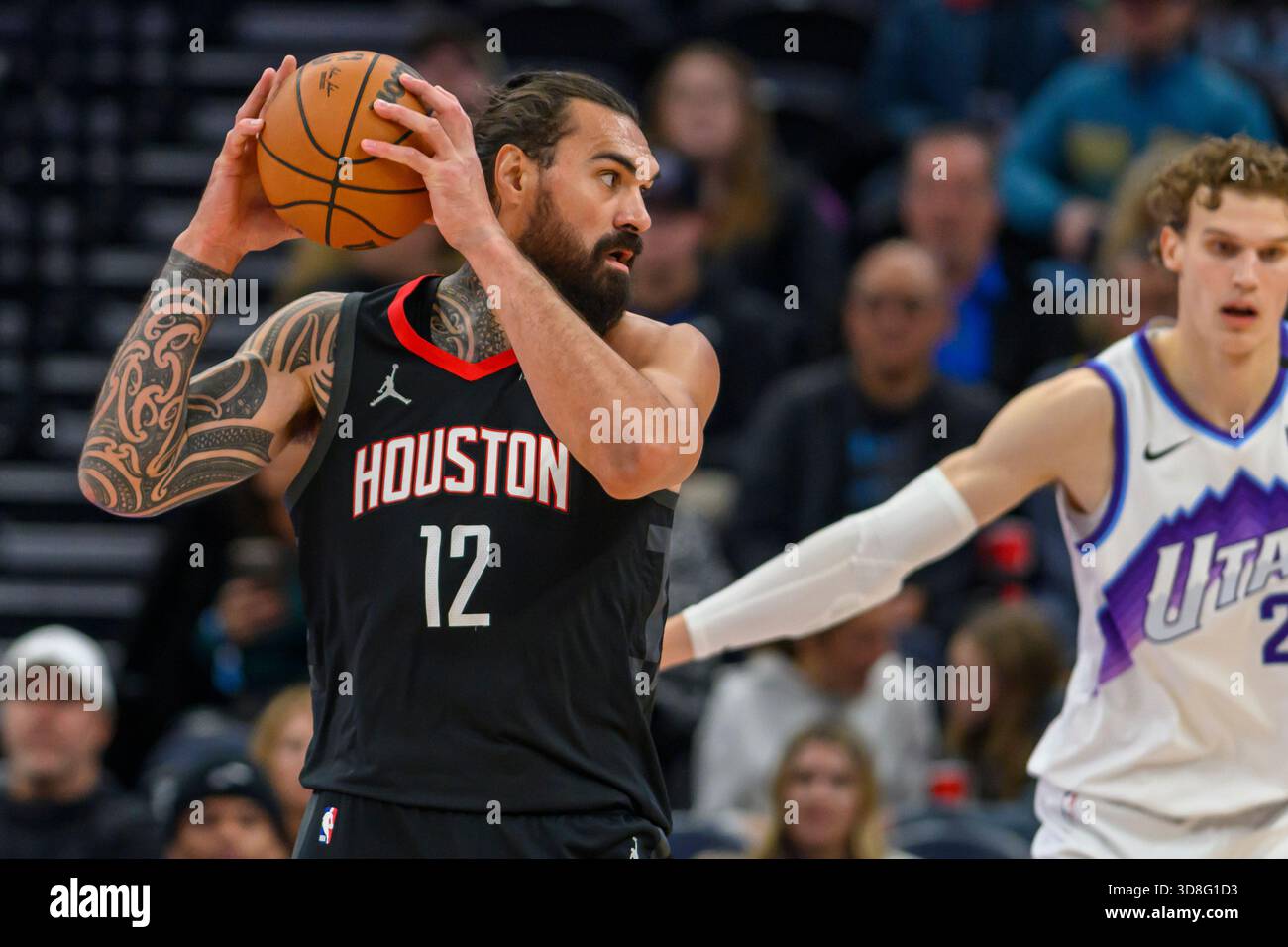 Houston Rockets center Steven Adams, left, posts up against Utah Jazz ...