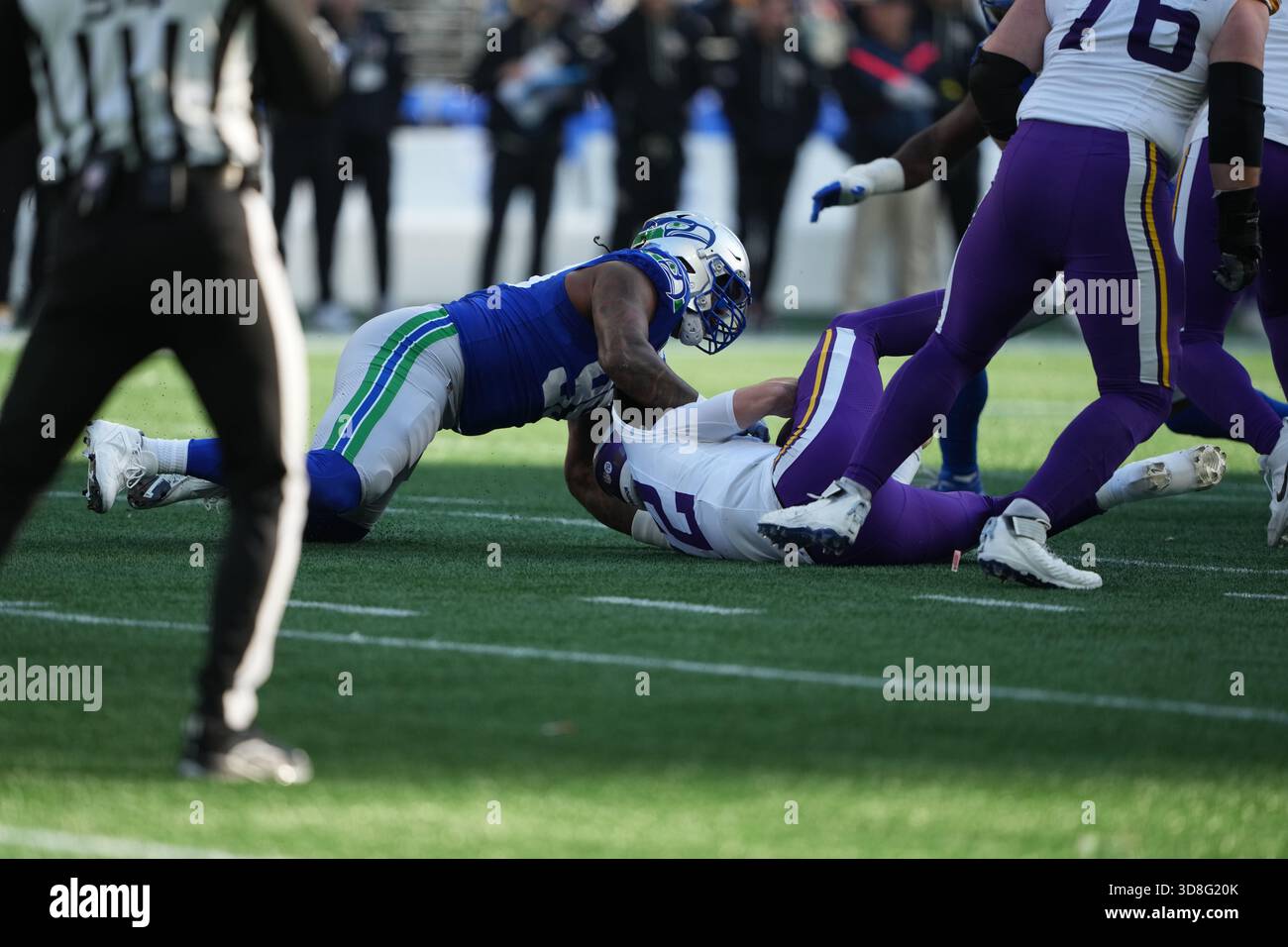 Seattle Seahawks defensive end Leonard Williams, left, sacks Minnesota ...