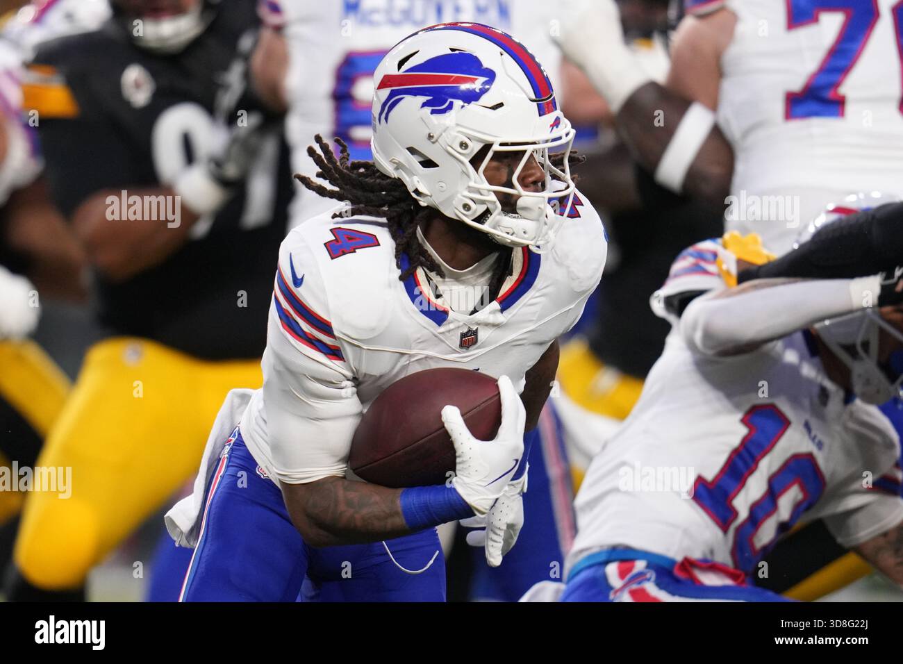 Buffalo Bills running back James Cook III (4) runs the ball during the ...