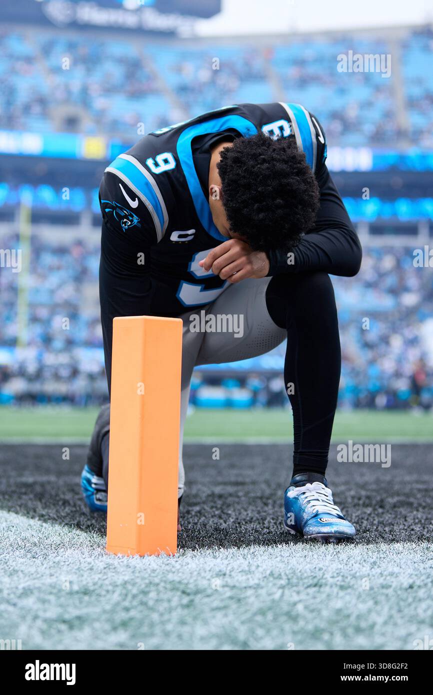 Carolina Panthers quarterback Bryce Young (9) kneels in prayer prior to ...