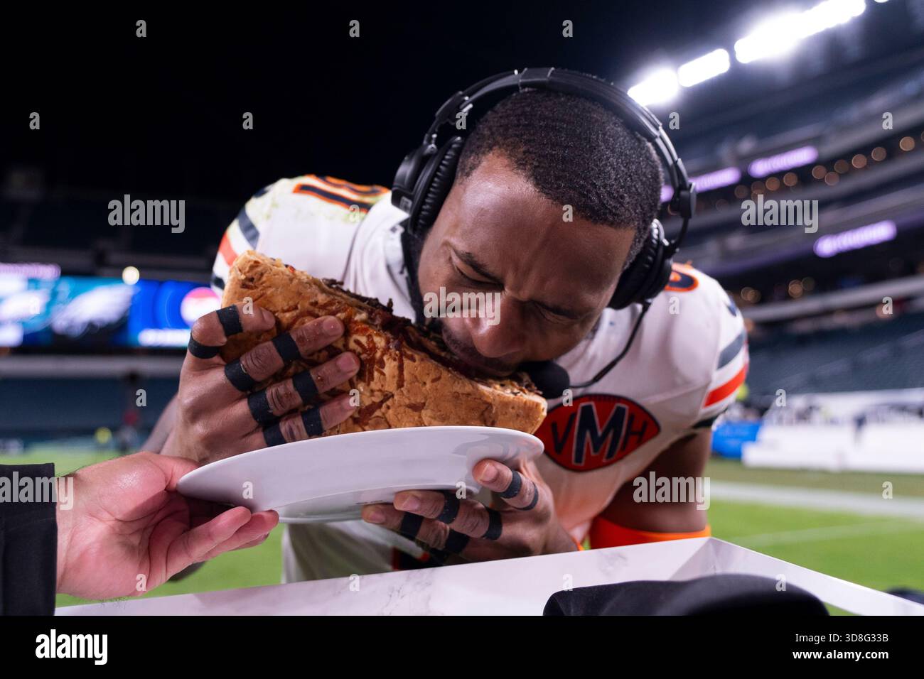 Chicago Bears defensive back Kevin Byard III ltakes a bite of the Prime ...