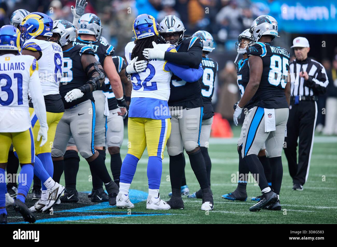 Carolina Panthers offensive tackle Ikem Ekwonu (79) hugs Los Angeles ...