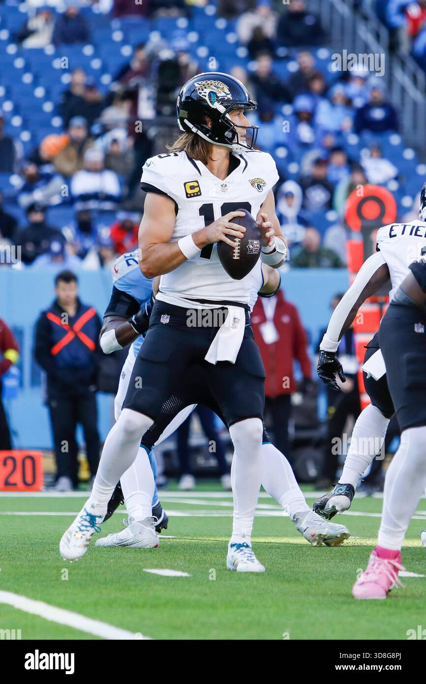 Jacksonville Jaguars quarterback Trevor Lawrence (16) looks to throw a ...