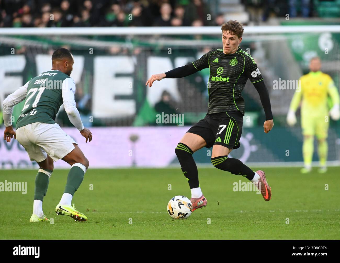Arne engels of celtic with jordan obita of hibs hi-res stock ...