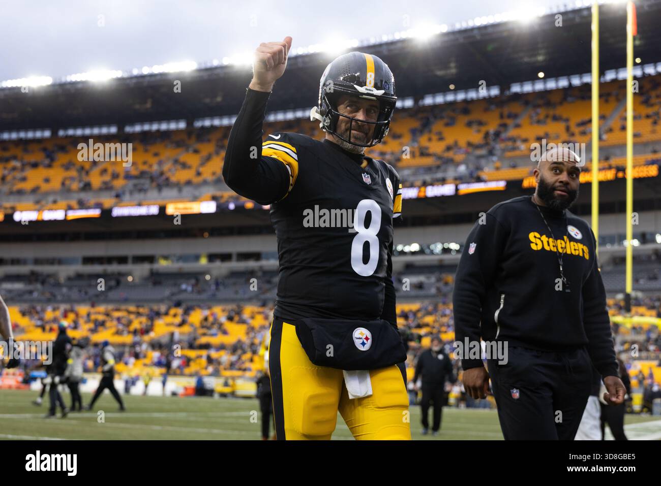Pittsburgh Steelers quarterback Aaron Rodgers (8) signals to fans ...