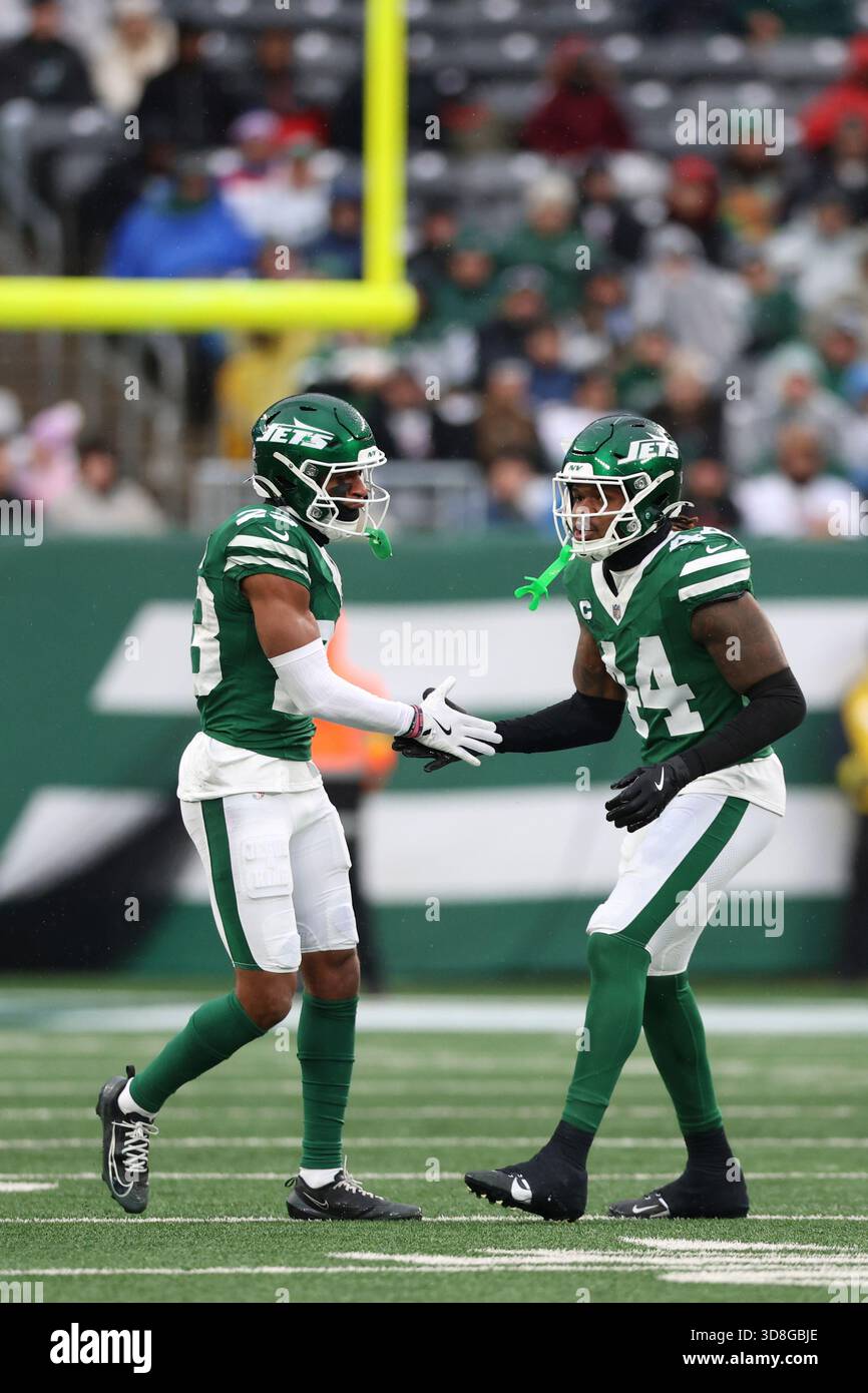 New York Jets cornerback Azareye'h Thomas (23) and linebacker Jamien ...