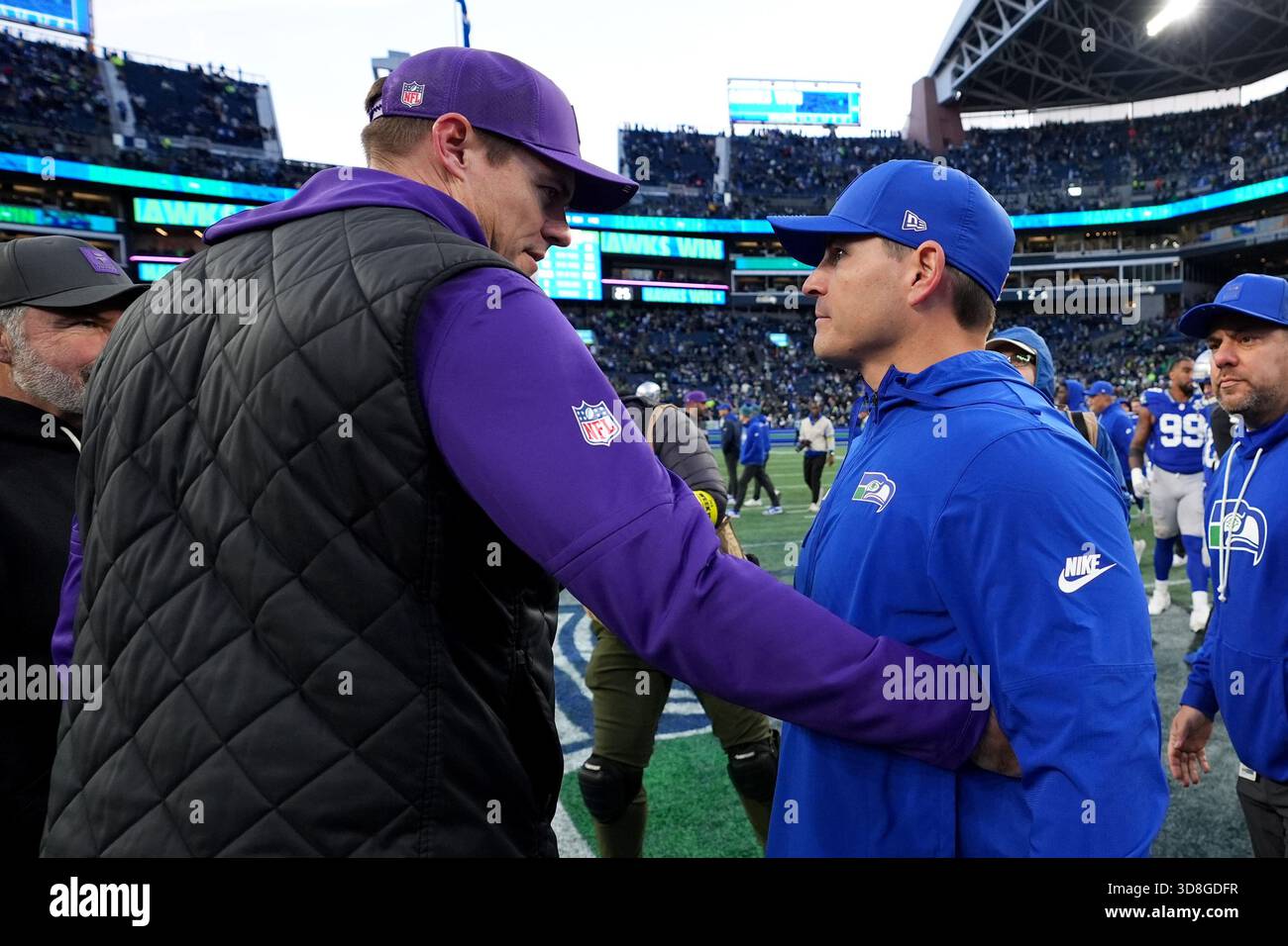 Seattle Seahawks head coach Mike Macdonald and Minnesota Vikings head ...