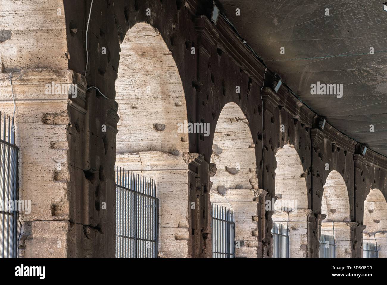 Italy - Rome - Colosseum - Interior corridor with stone arches and ...