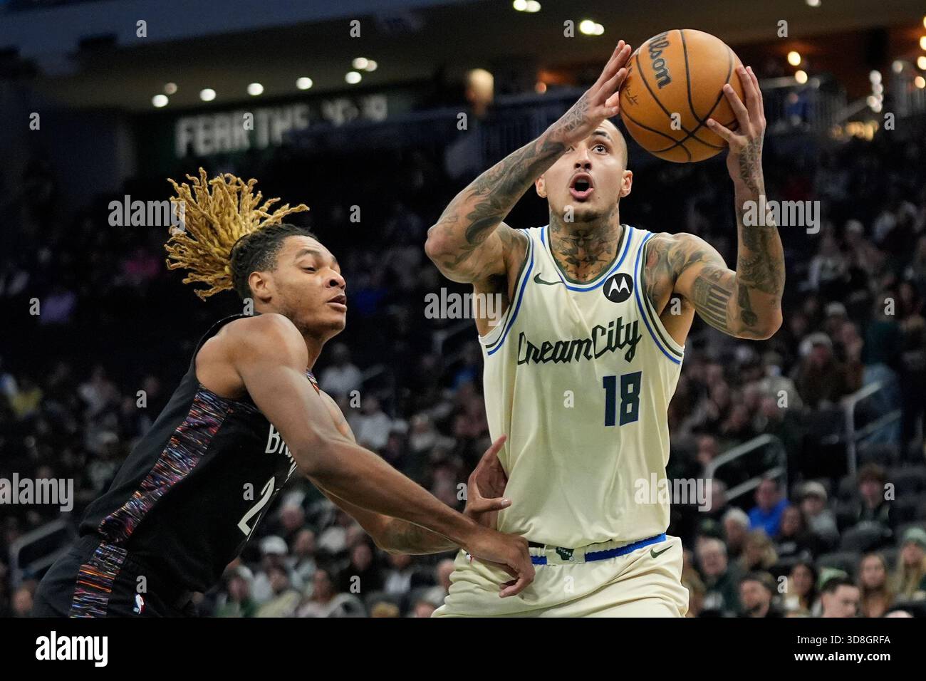 Milwaukee Bucks' Kyle Kuzma drives to the basket against Brooklyn Nets ...