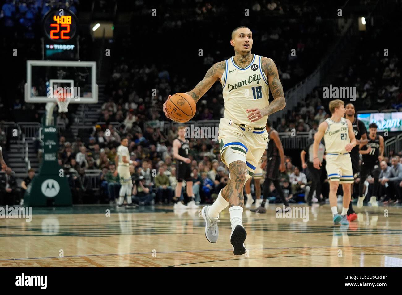 Milwaukee Bucks' Kyle Kuzma drives to the basket during an NBA ...