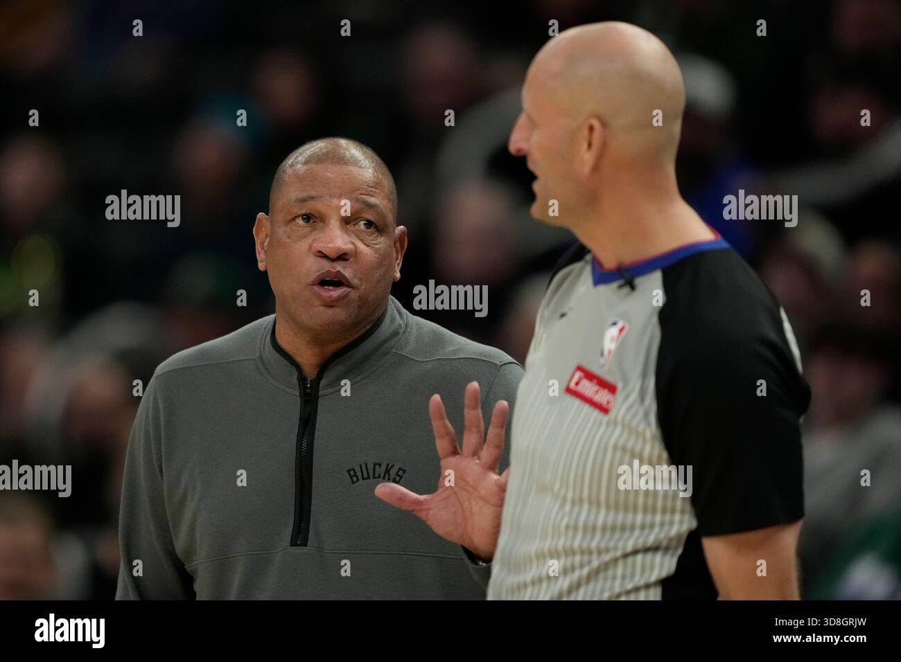 Milwaukee Bucks head coach Doc Rivers talks with an official during an ...