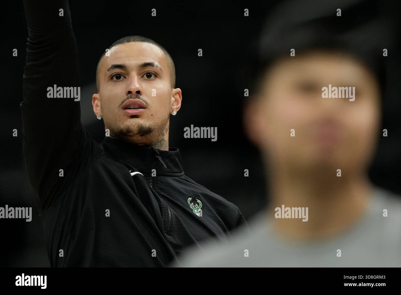 Milwaukee Bucks' Kyle Kuzma warms up before an NBA basketball game ...