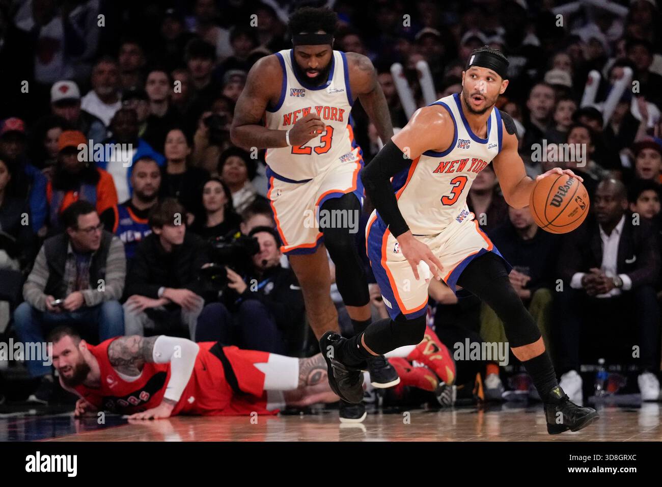 New York Knicks guard Josh Hart (3) dribbles down the court during the ...