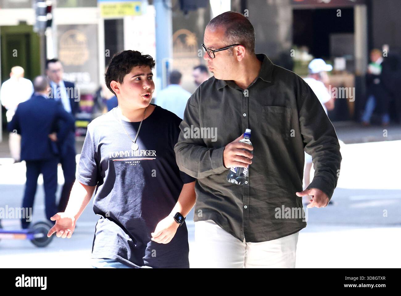 Nicholas Tadros (C) arrives with father Simon (Right) for the Coroners ...