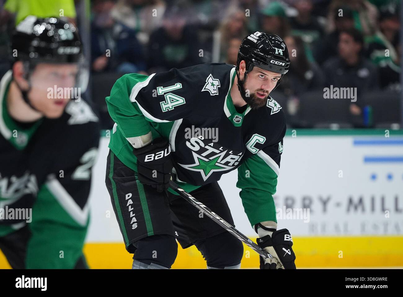 Dallas Stars left wing Jamie Benn (14) lines up for a puck drop during ...