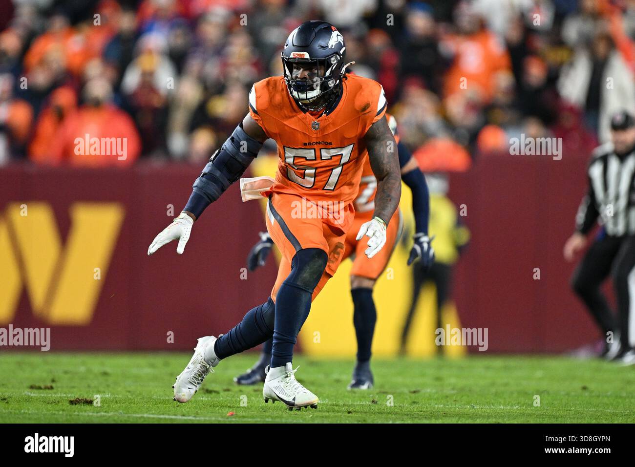 Denver Broncos linebacker Dre Greenlaw (57) in action during the first ...