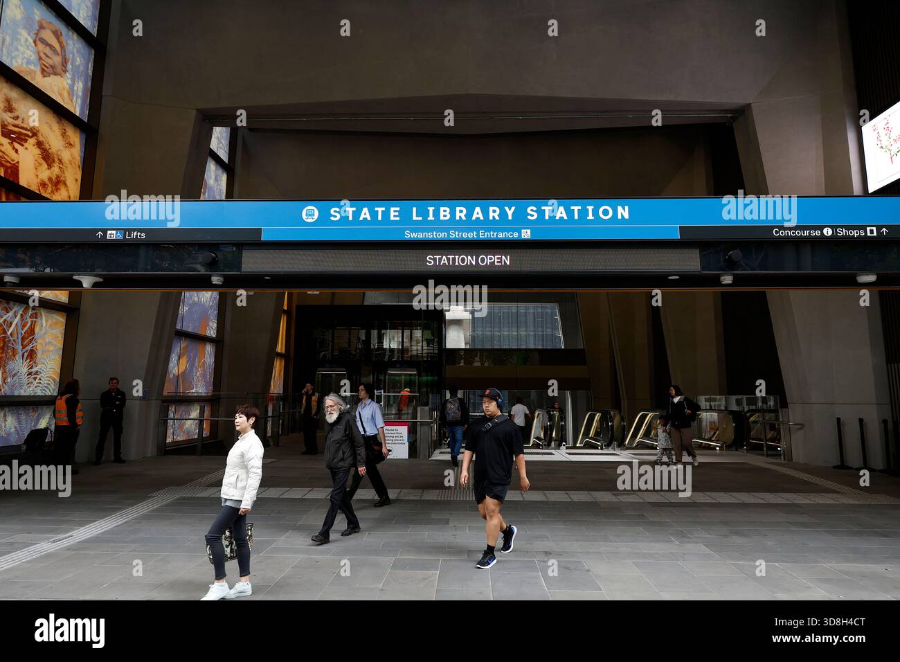 People are seen at State Library Station in Melbourne, Monday, December ...