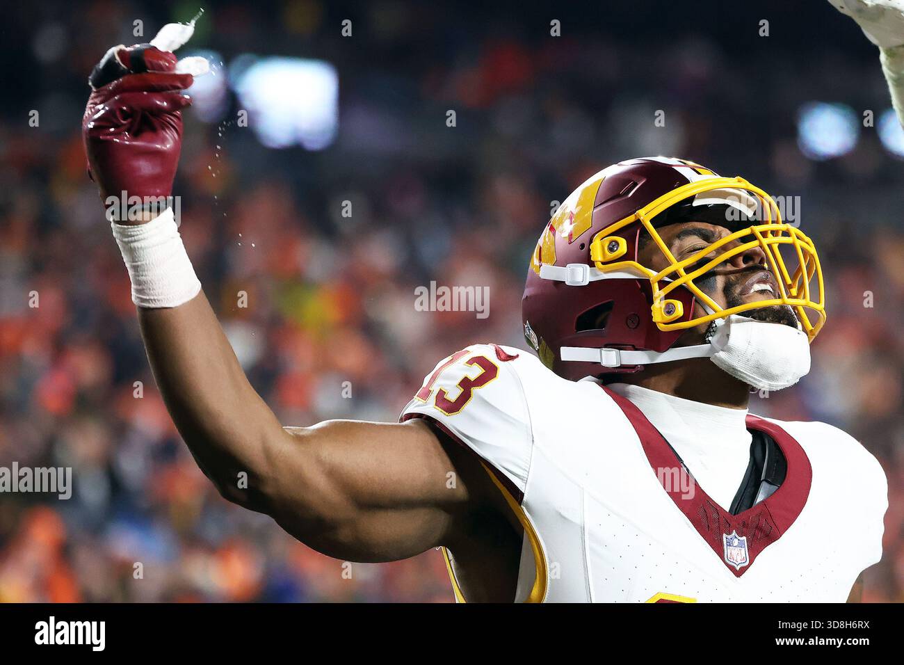 Washington Commanders wide receiver Treylon Burks (13) celebrates ...