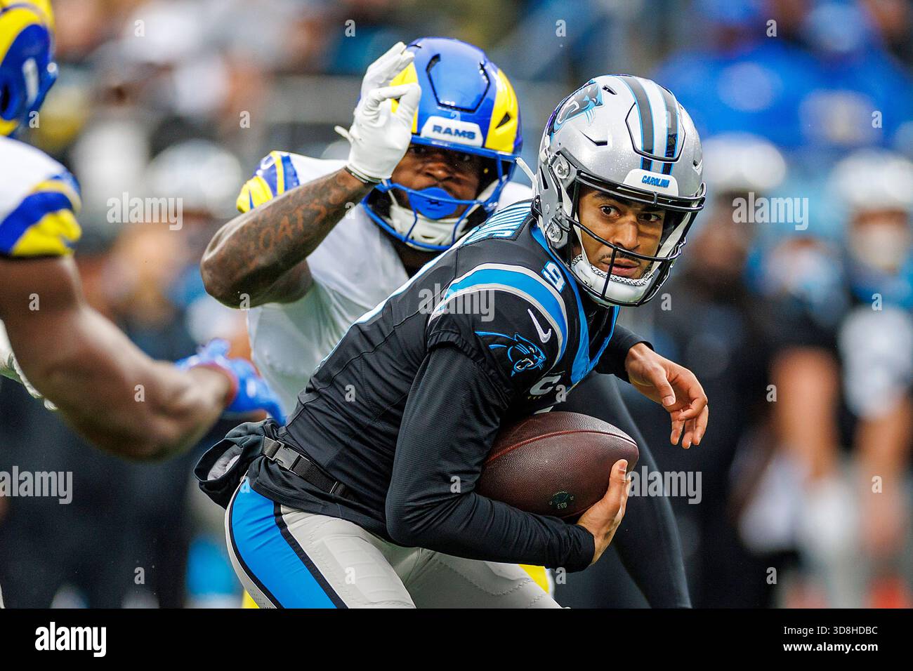Carolina Panthers quarterback Bryce Young (9) comes under pressure from ...