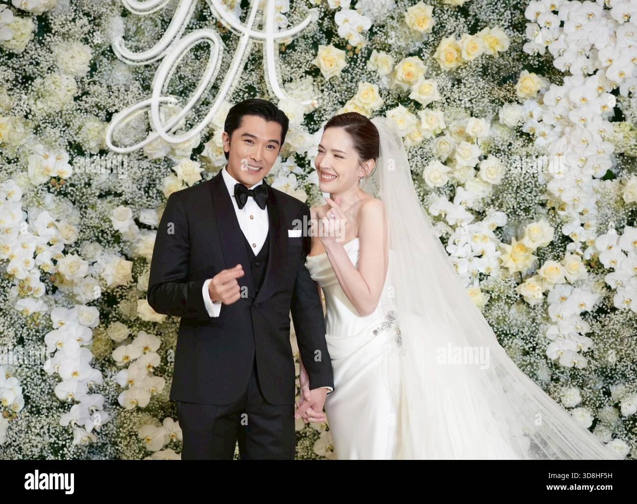 Taiwanese actor, singer and racing driver Roy Chiu and Taiwanese ...