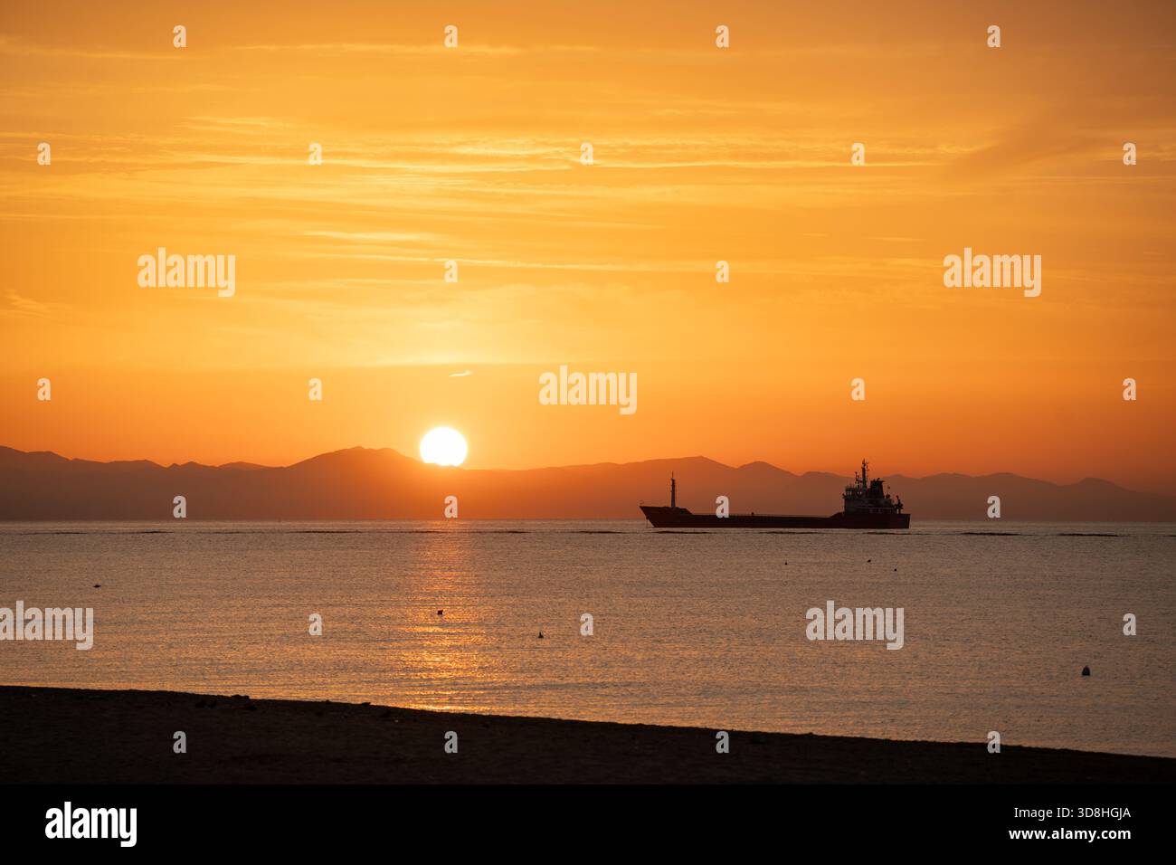dawn naval vessel navigating early waters, silhouette of vessel ...