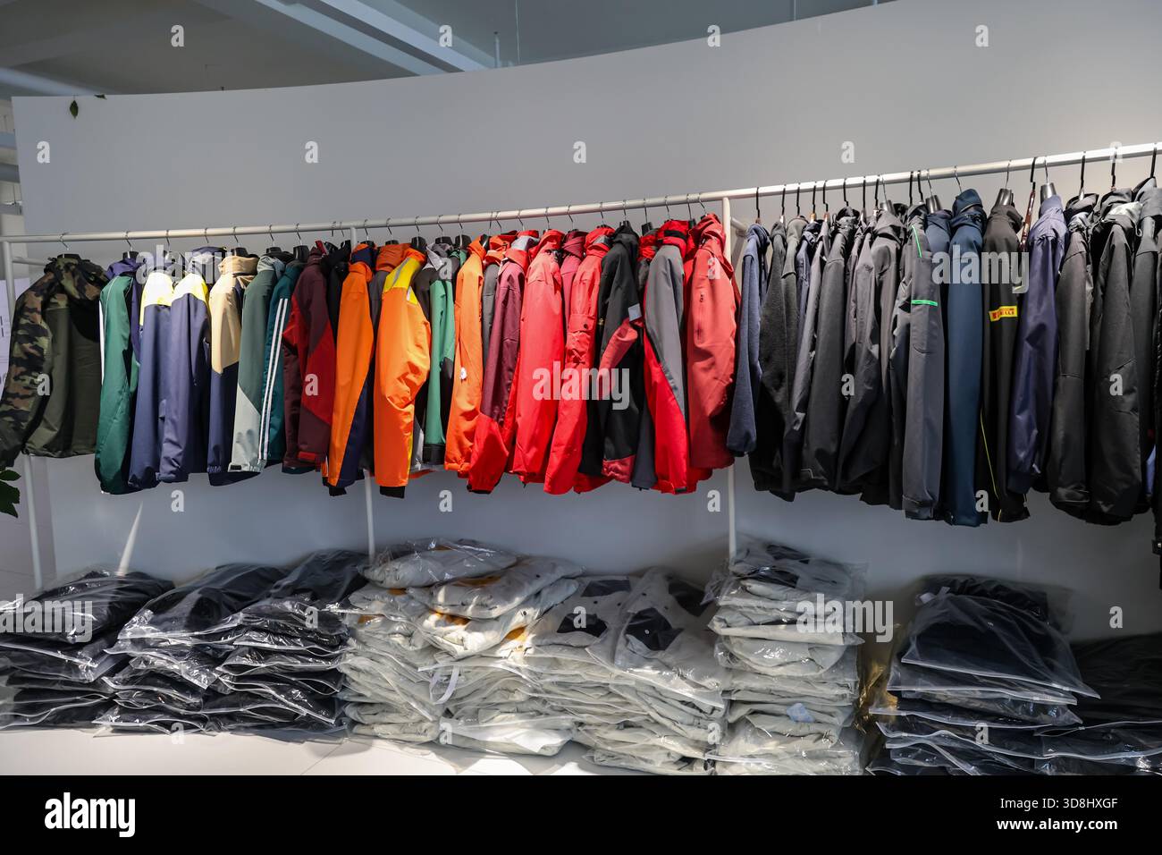 Staff members make outdoor jackets in a factory in Sanmen County ...