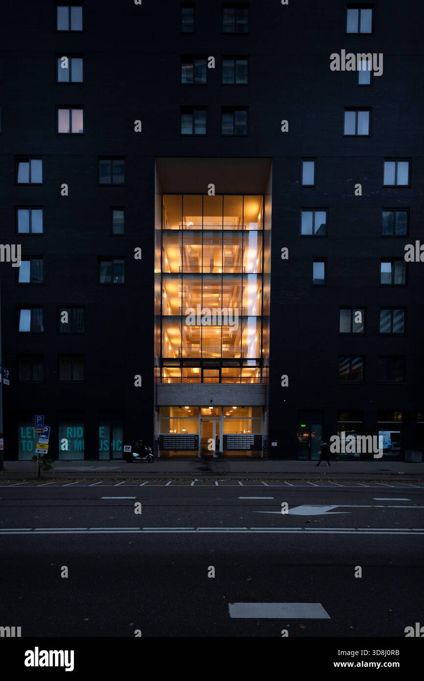 Amsterdam Zudias Apartment building at dusk Stock Photo - Alamy