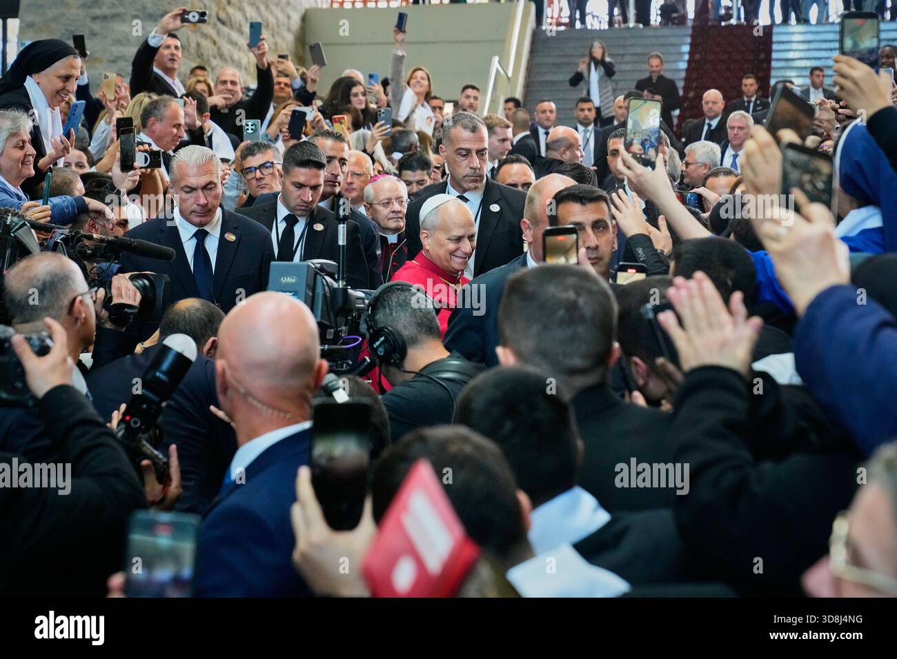 Pope Leo XIV is greeted as he arrives at the Catholic basilica of ...