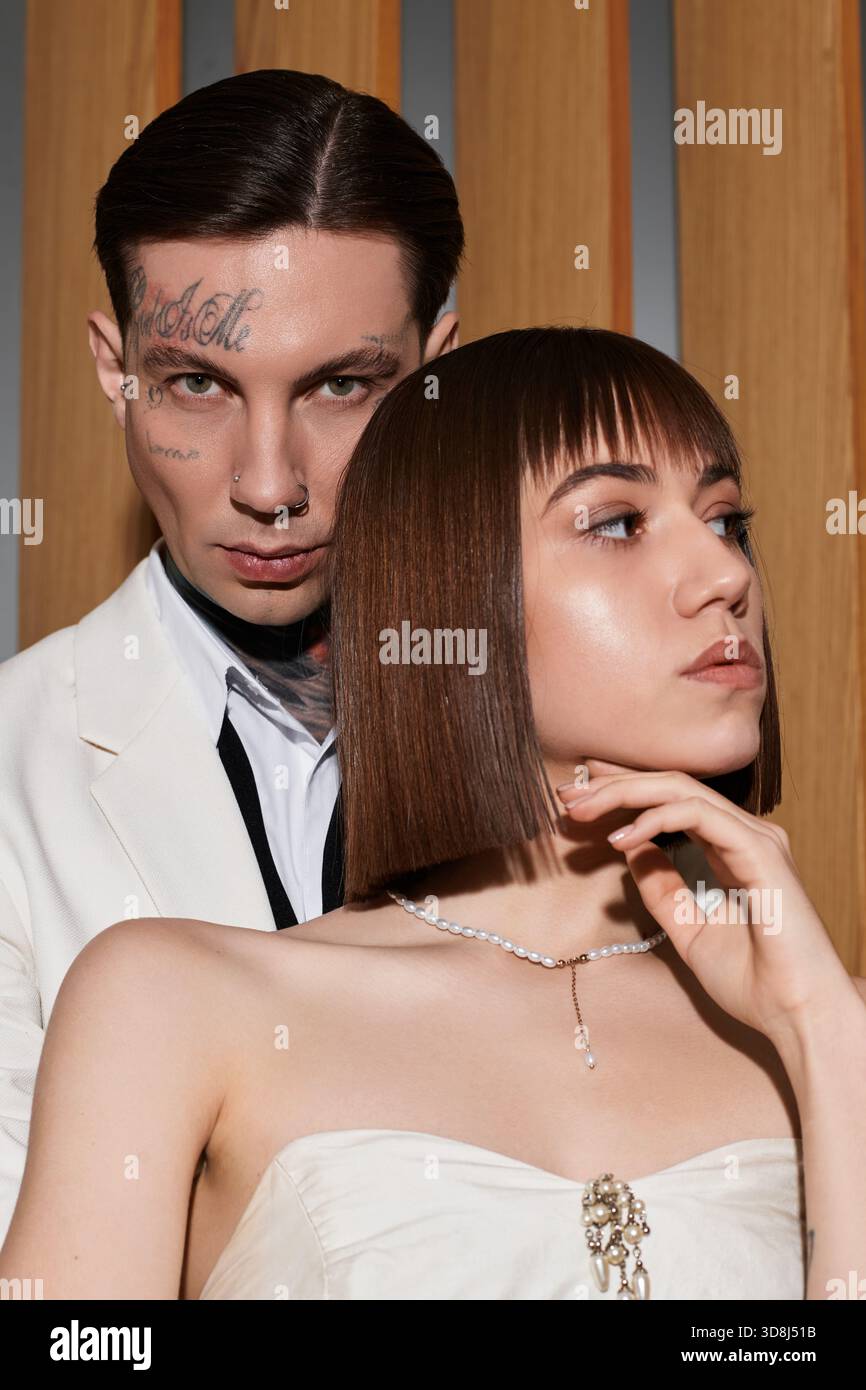 A modern couple expresses their deep connection in a luxurious hotel ...